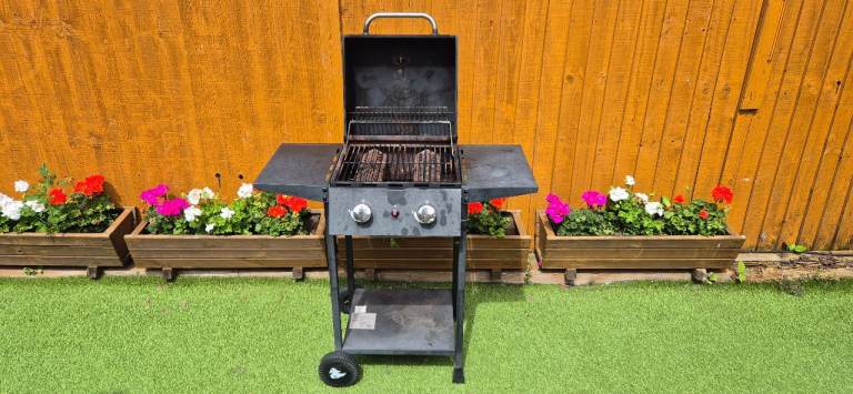Two burners gas BBQ with two side folding shelves., £35.00 for Sale