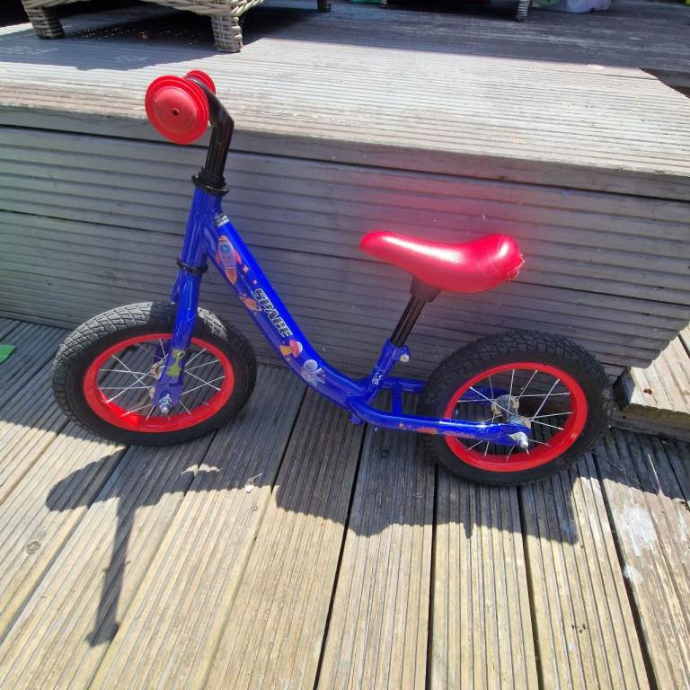 Blue and red space themed balance bike | in Chatham, Kent | Gumtree
